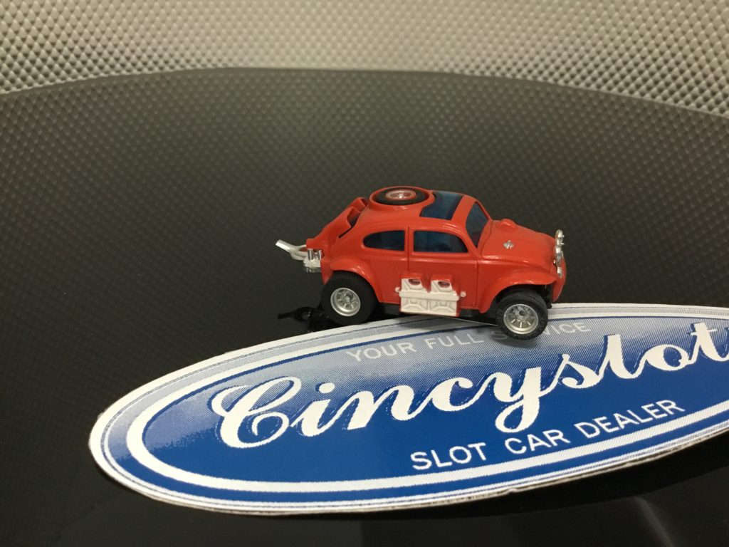 AFX RED BAJA BUG HO SLOT CAR. LIGHTLY USED.