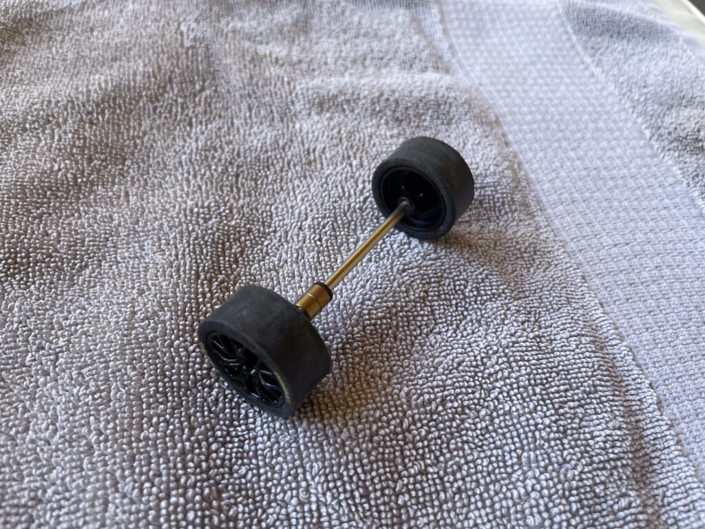Carrera D124 85523 Front Axle w/ Tires, Takeoff